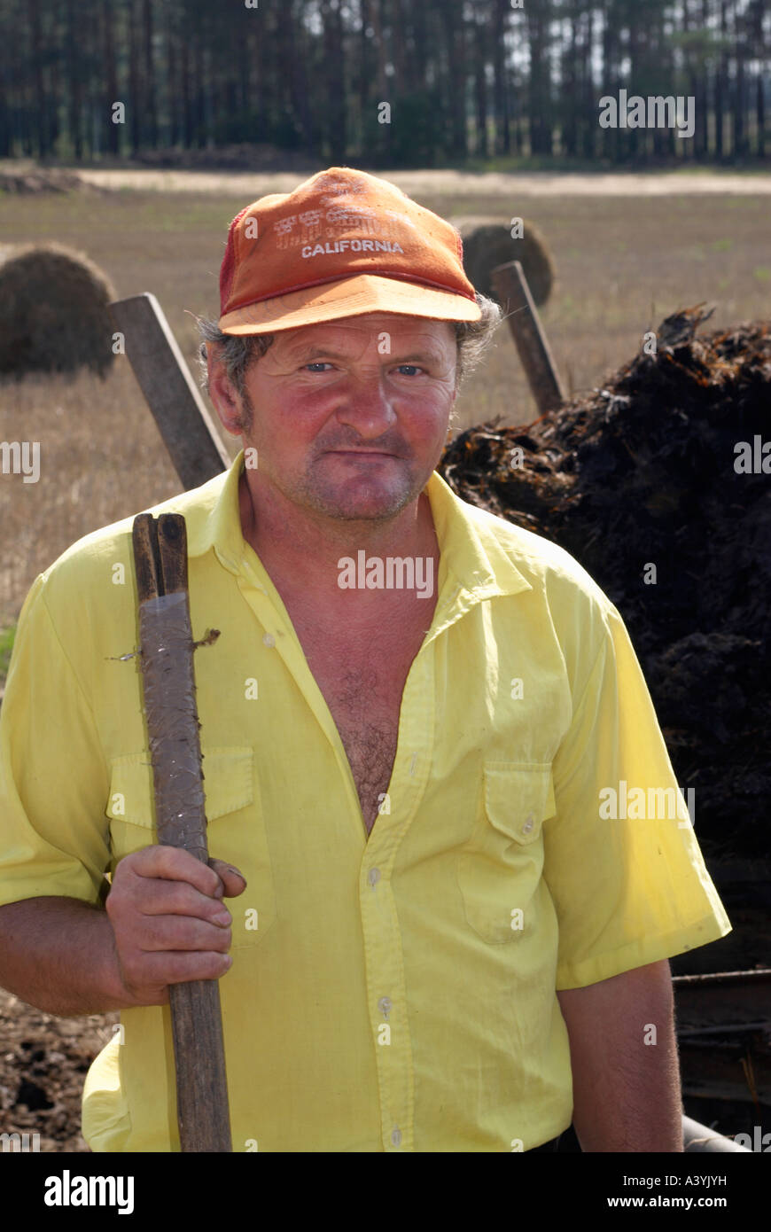 A farmer on a traditional farm in Poland Stock Photo - Alamy
