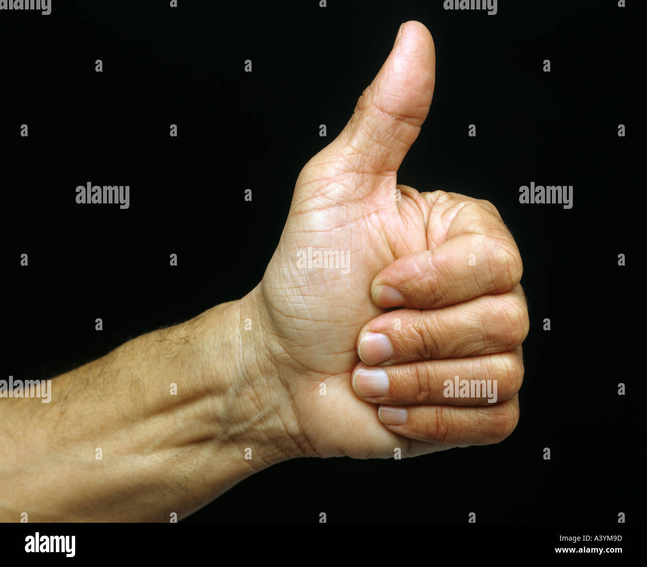 close up of male hand doing the thumbs up sign Stock Photo - Alamy