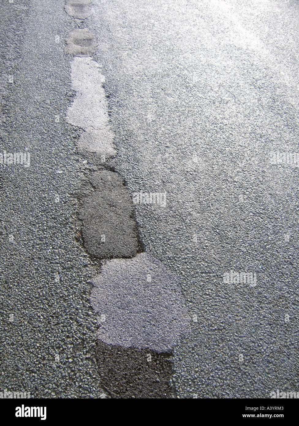 patched up road Stock Photo - Alamy