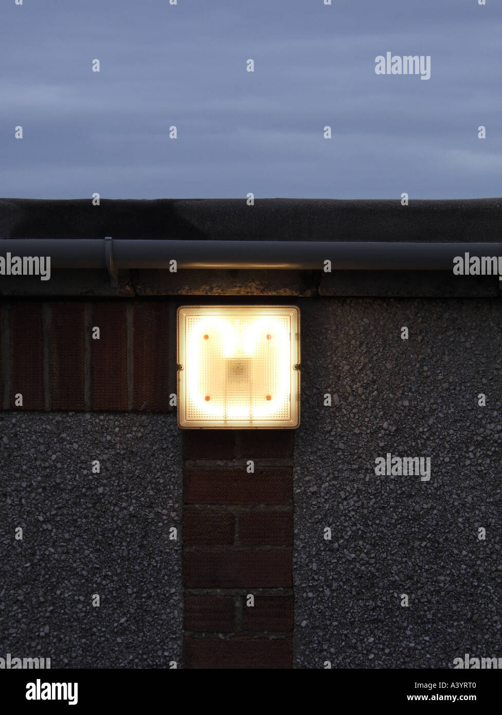 security light on building at night Stock Photo - Alamy
