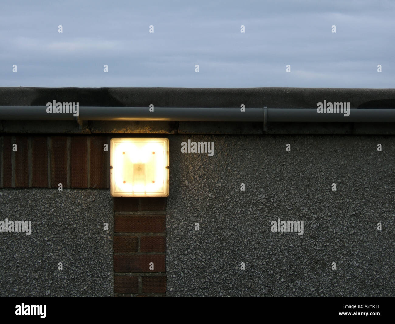 security light on building at night Stock Photo - Alamy