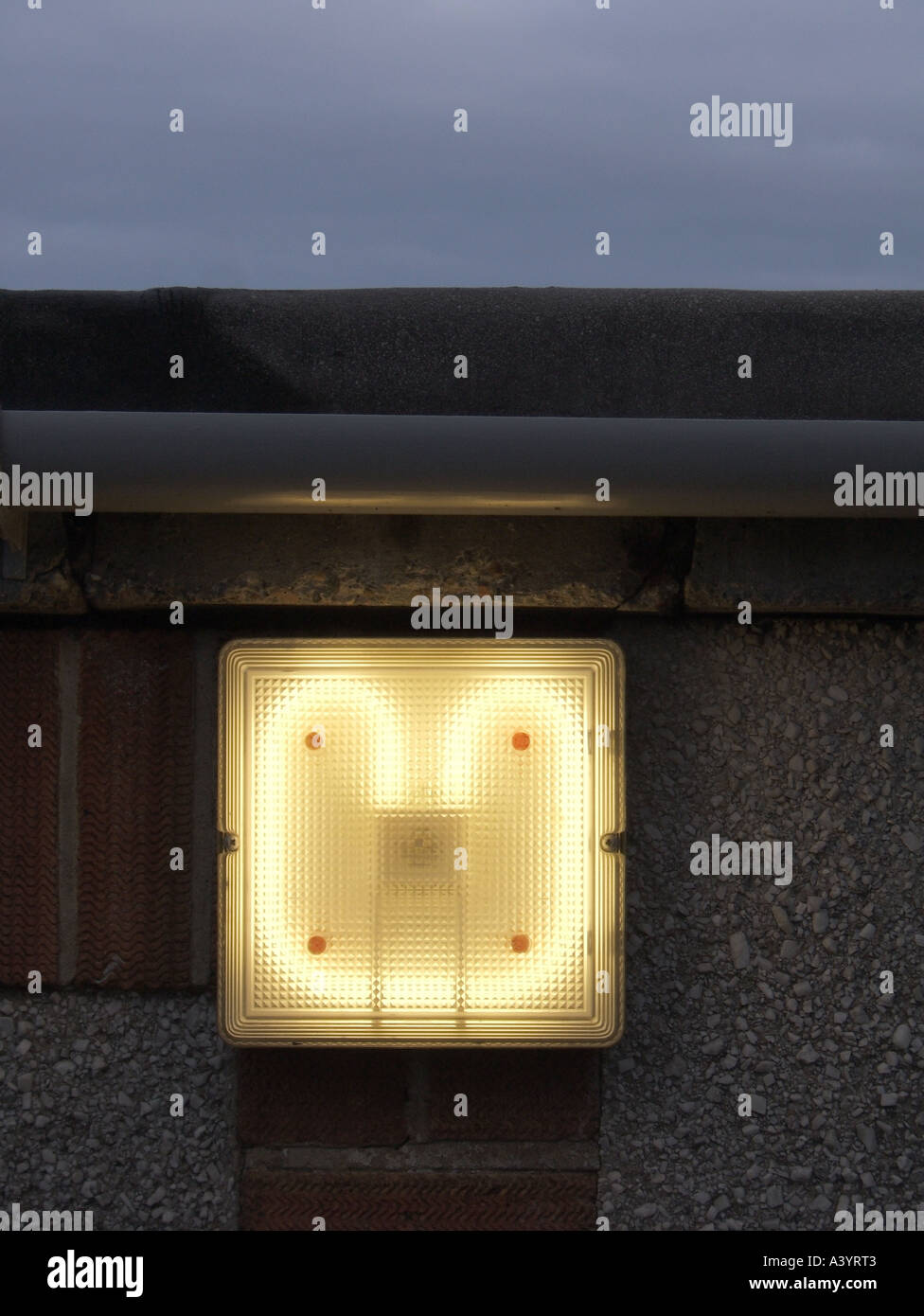 security light on building at night Stock Photo - Alamy