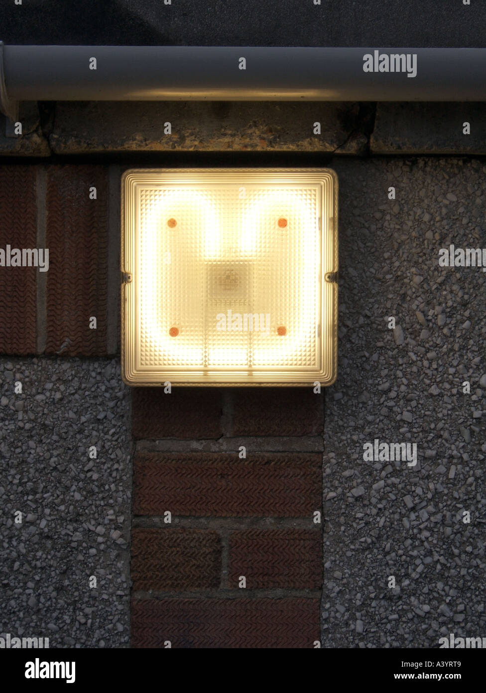 security light on building at night Stock Photo - Alamy