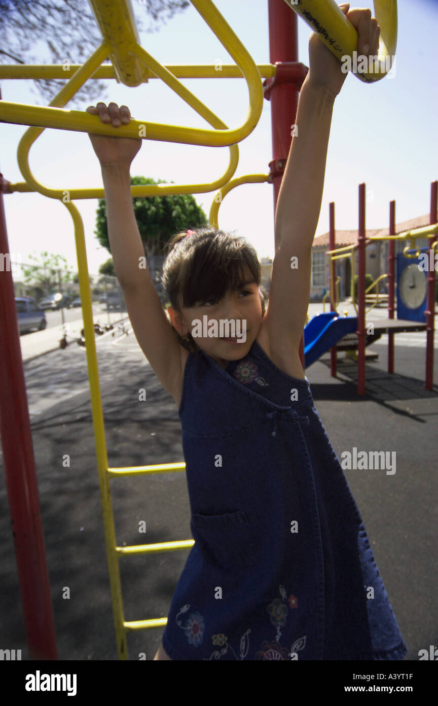 student playing on bars Stock Photo - Alamy