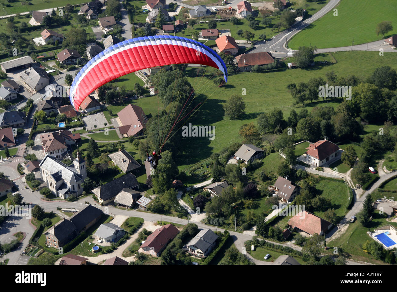 Paraglider over cultural landscape hi-res stock photography and images ...