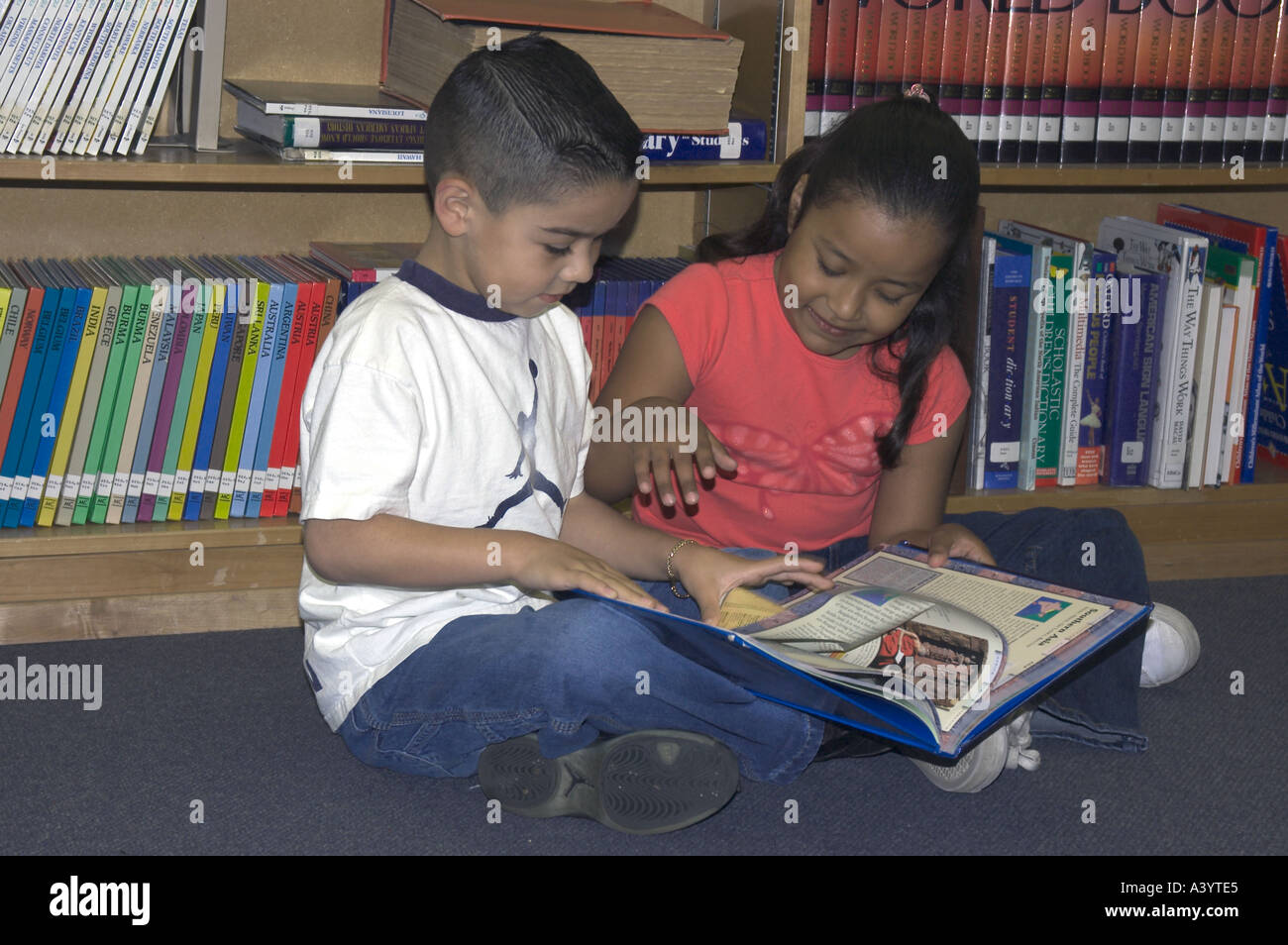 Boy stand library hi-res stock photography and images - Alamy