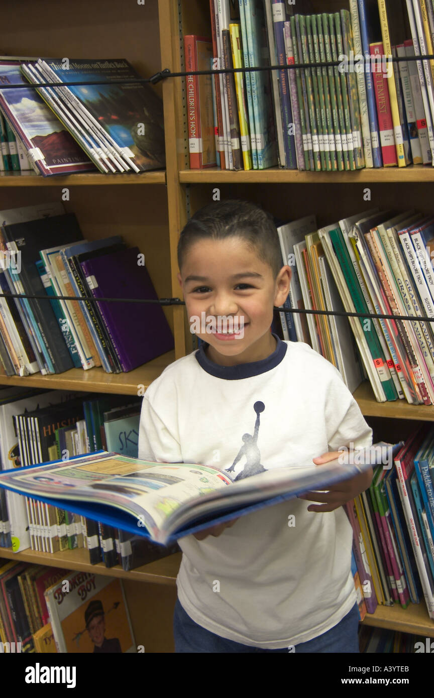 boy in library Stock Photo - Alamy