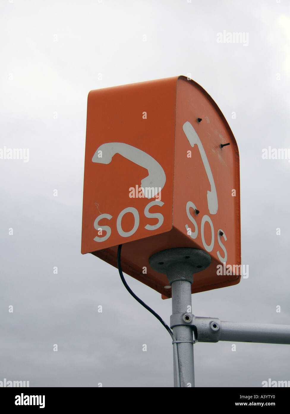 sos emergency phone by sea Stock Photo - Alamy