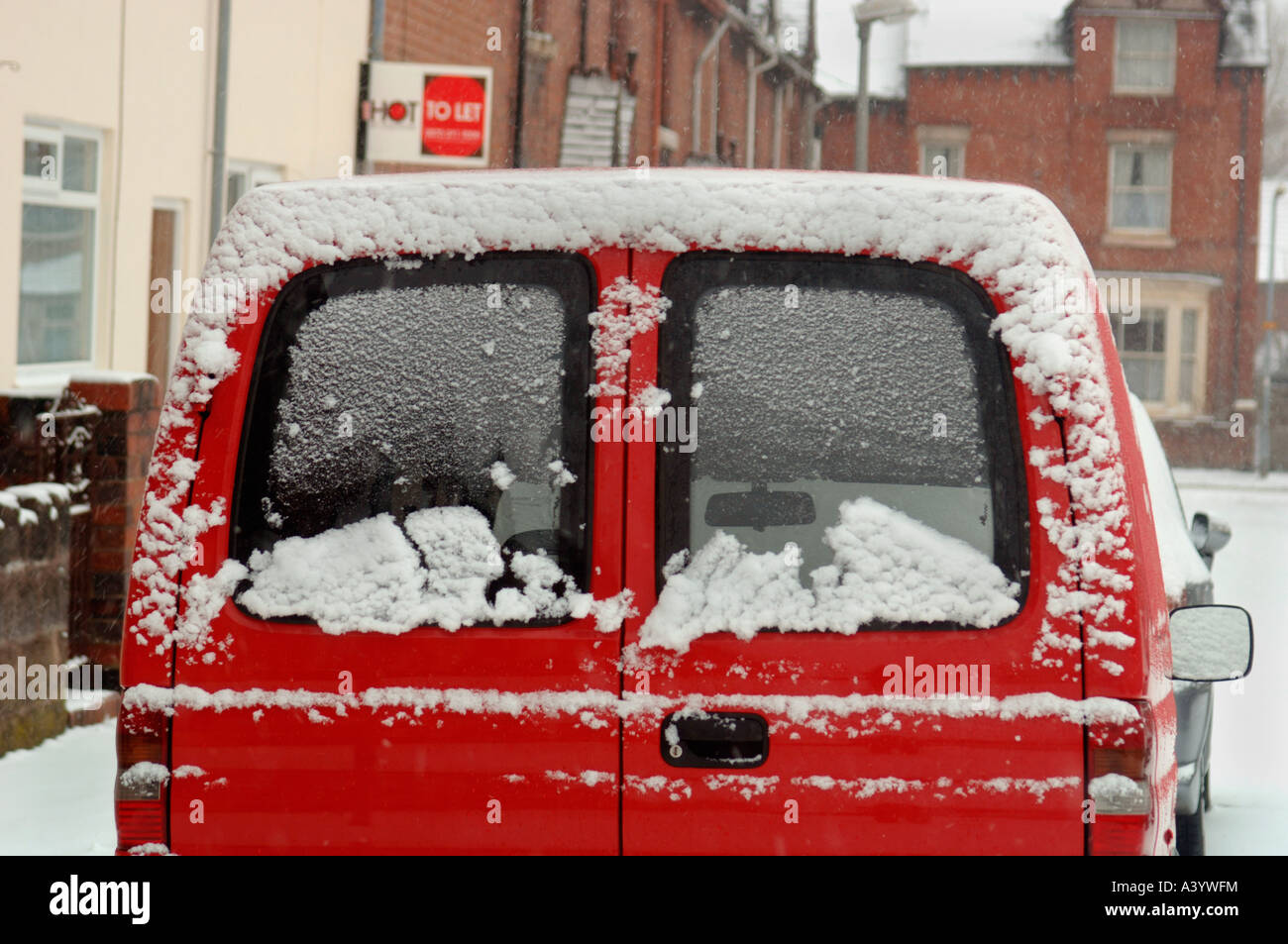Back View, Of A Bright Red Van, During A Snow Storm Stock Photo - Alamy