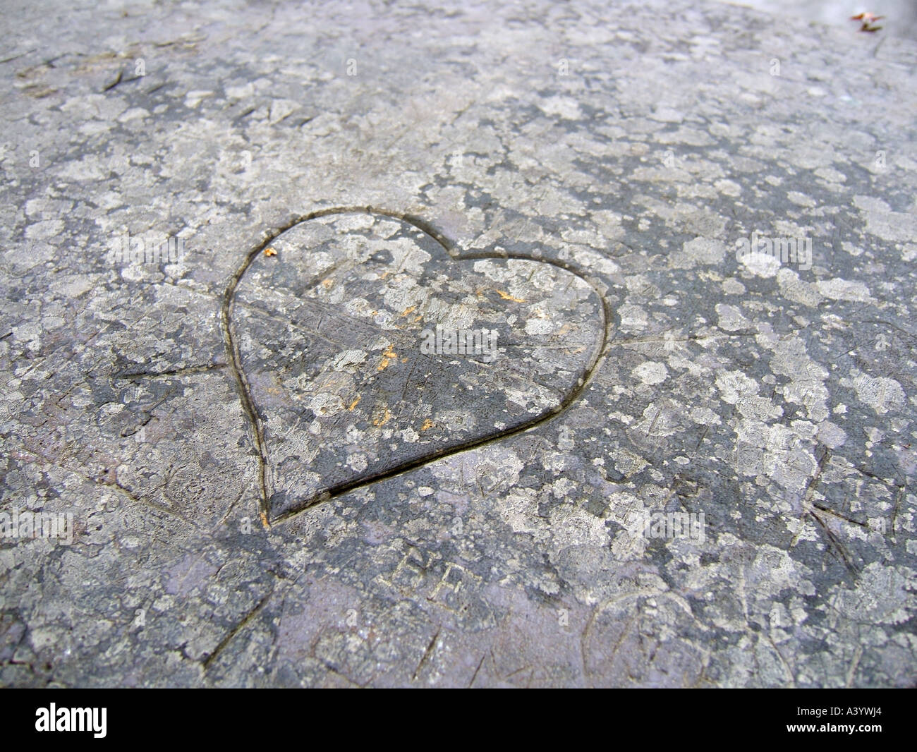 heart carved into old slate slab Stock Photo - Alamy