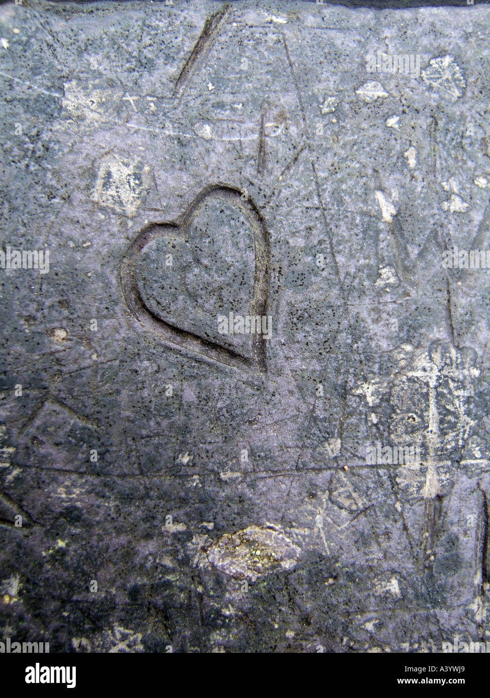 heart carved into old slate slab Stock Photo - Alamy