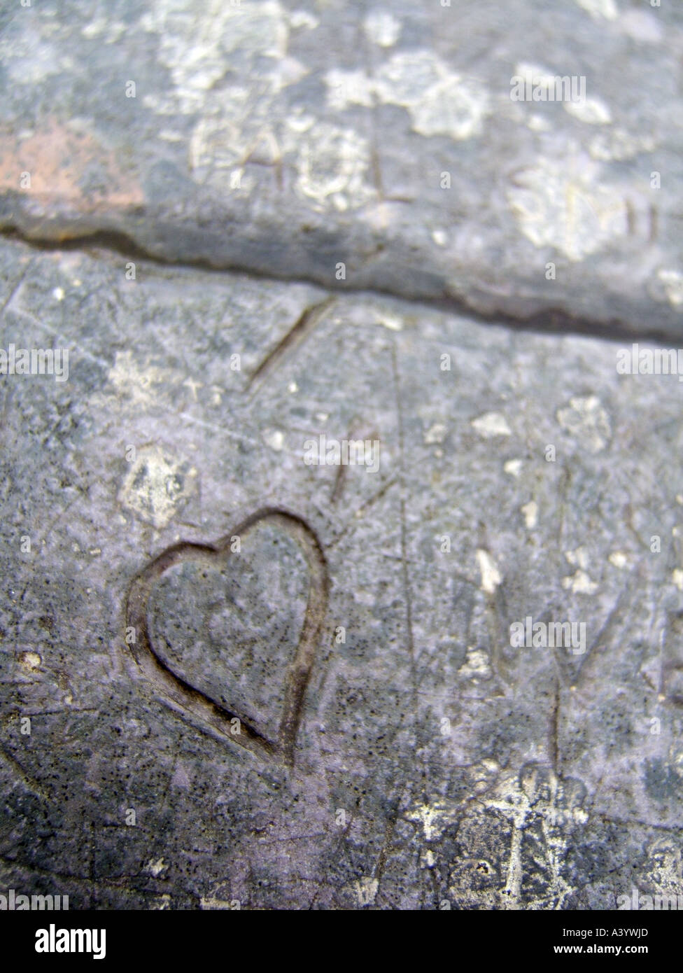 heart carved into old slate slab Stock Photo - Alamy