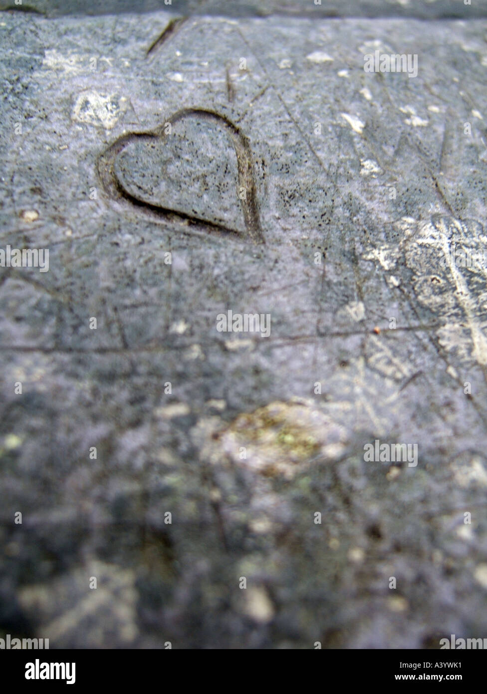heart carved into old slate slab Stock Photo - Alamy