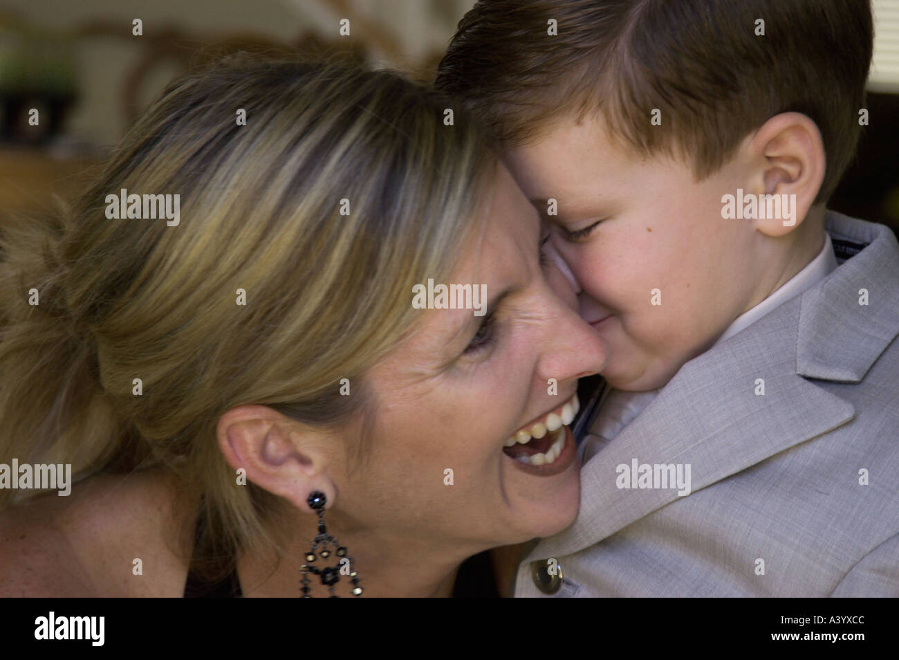 mother and son smiling together Stock Photo - Alamy