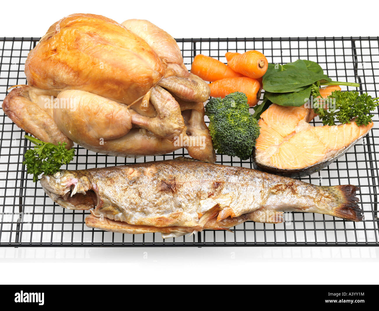 Roast Chicken with Vegetables and Fish Stock Photo - Alamy