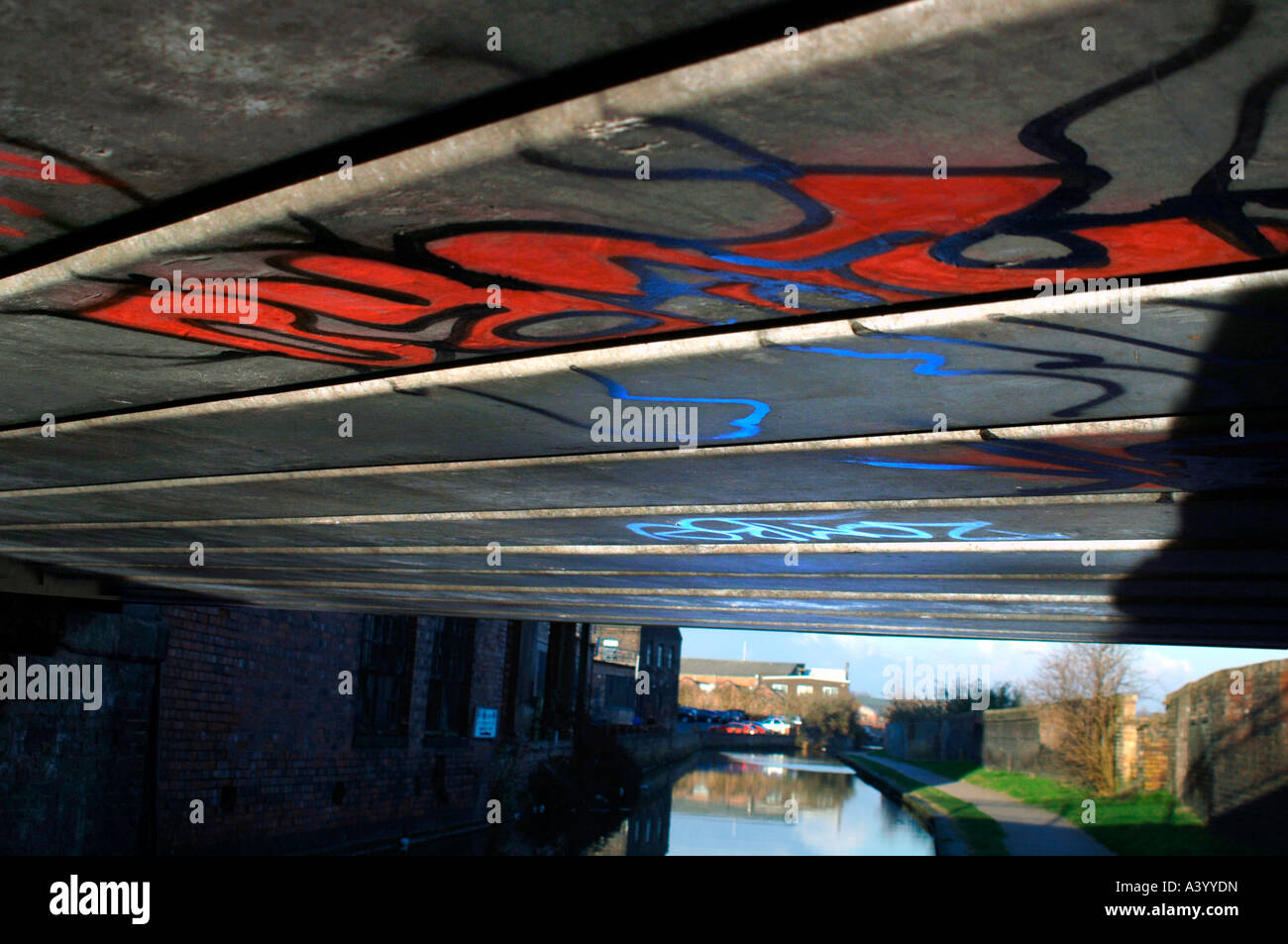 Graffiti Painted Onto The Underside Of A Canal Bridge Stock Photo - Alamy