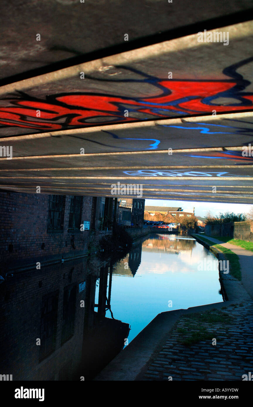 Graffiti Painted Onto The Underside Of A Canal Bridge Stock Photo - Alamy
