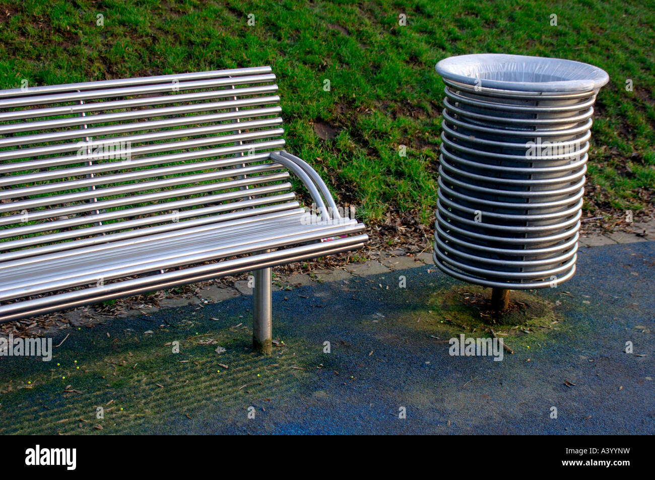 Modern Matching Designed, Park Bench & Waste Bin Stock Photo - Alamy