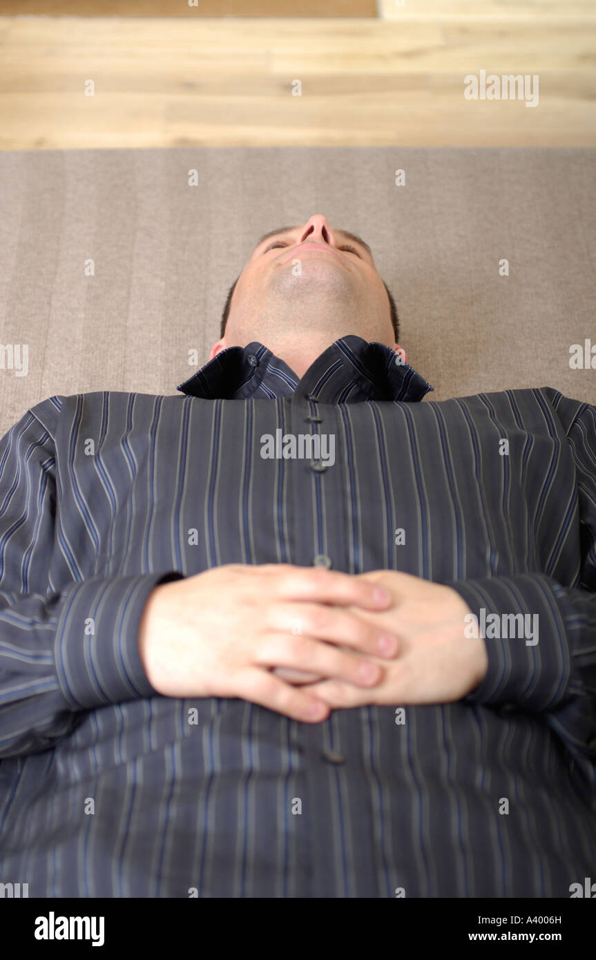 Portrait young man taking nap hi-res stock photography and images - Alamy