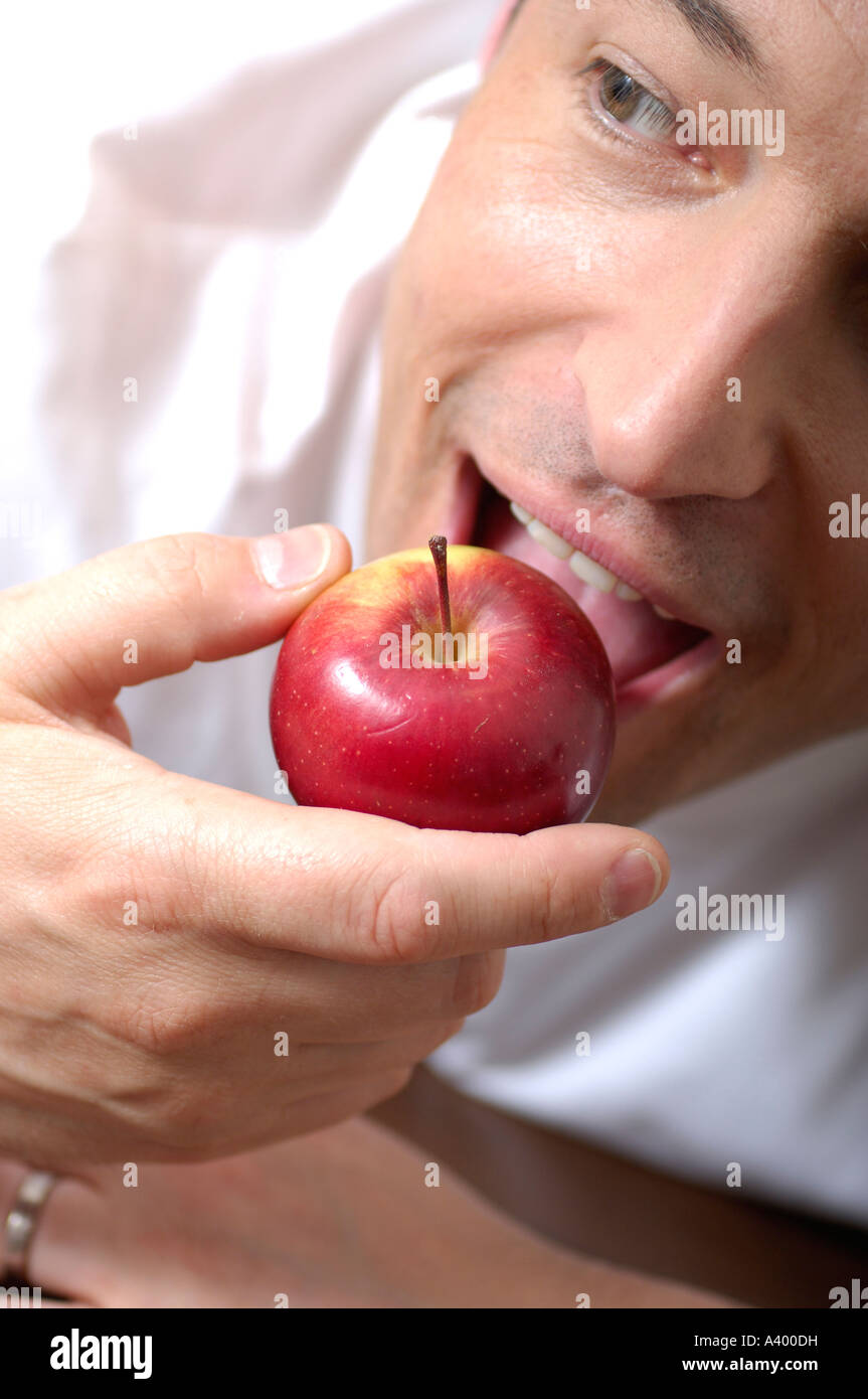 Portrait man apple in mouth hi-res stock photography and images - Alamy