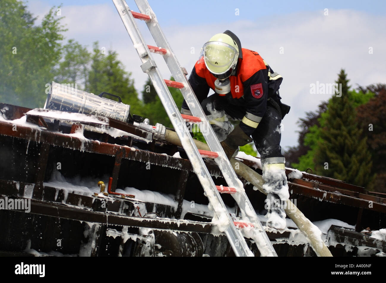 firemen extinguishing fire at a disaster practice train accident Stock ...