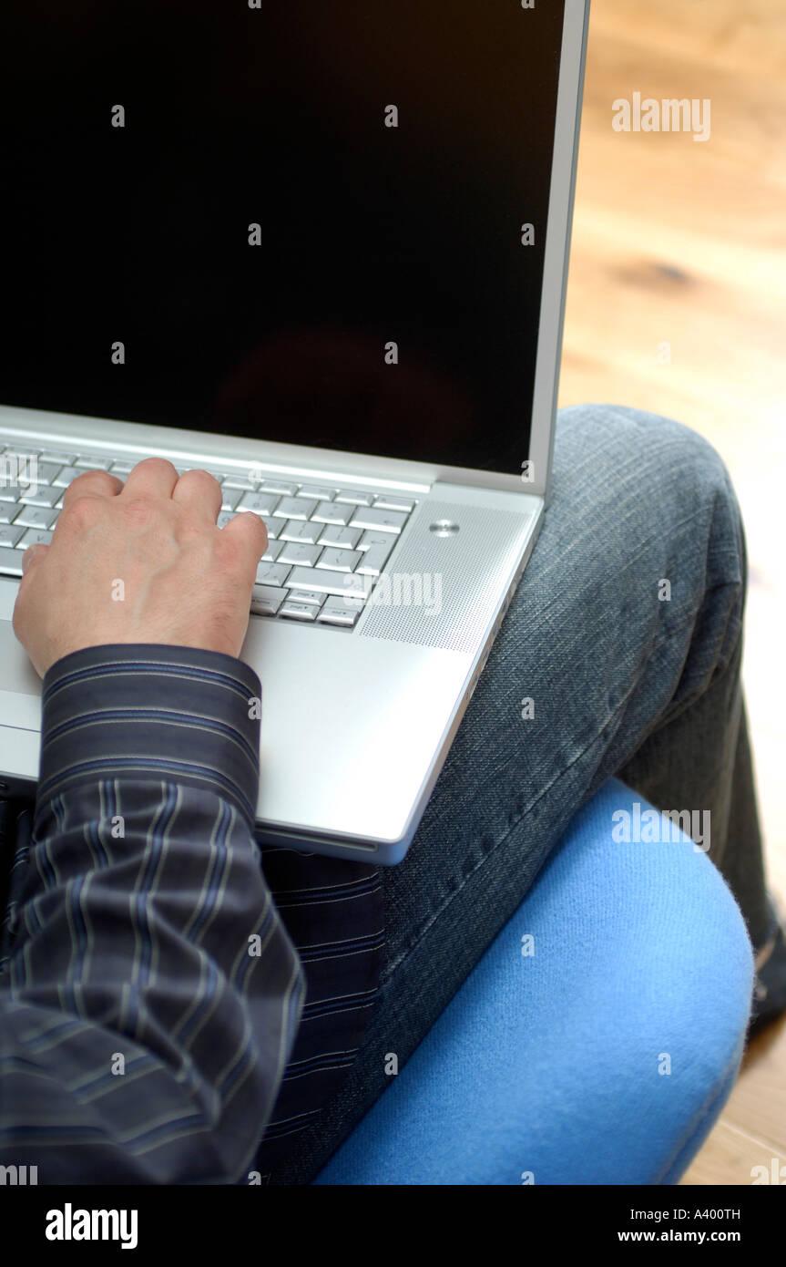 detail of young man with notebook computer Stock Photo - Alamy