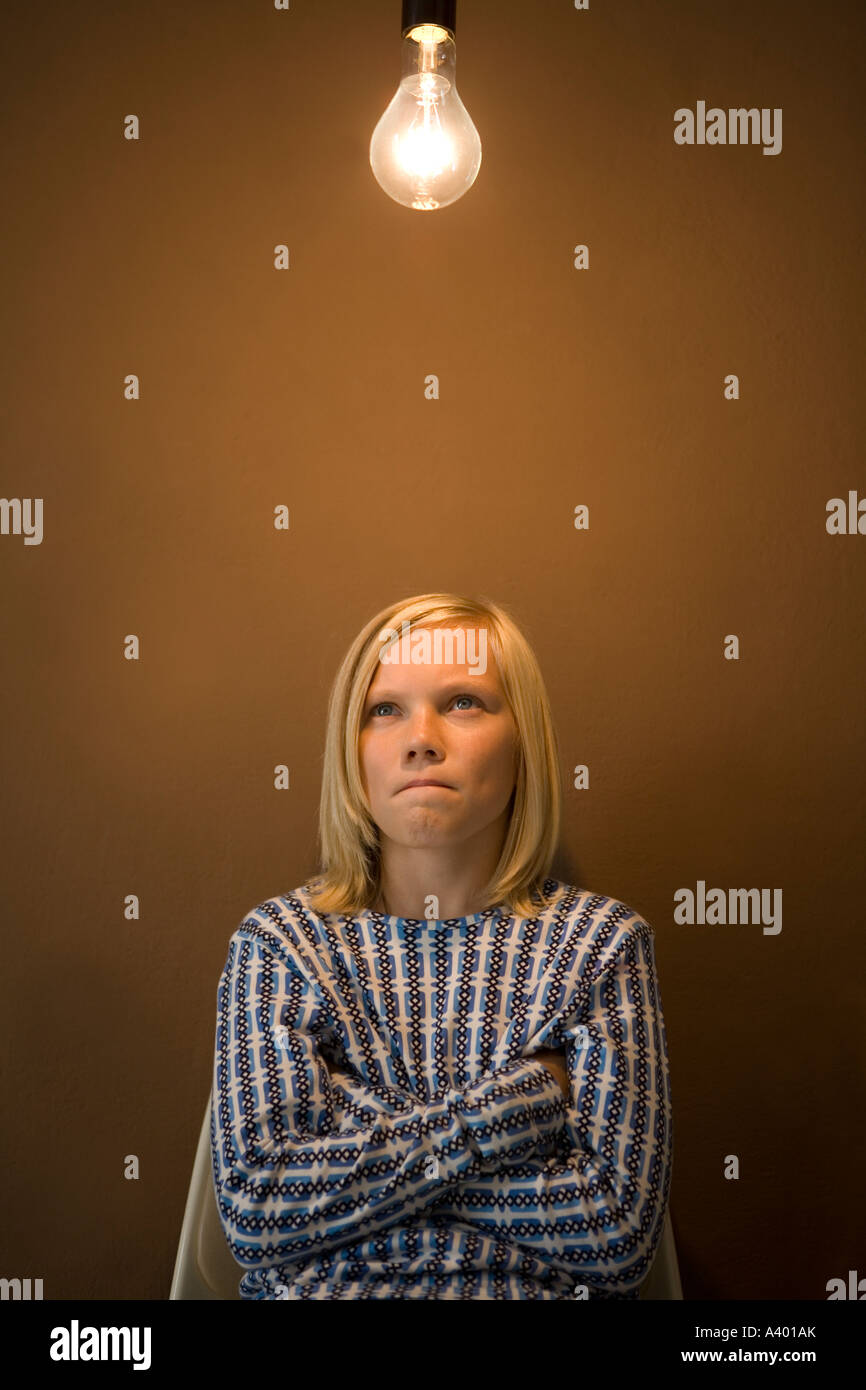 Child solving a problem thinking hi-res stock photography and images ...