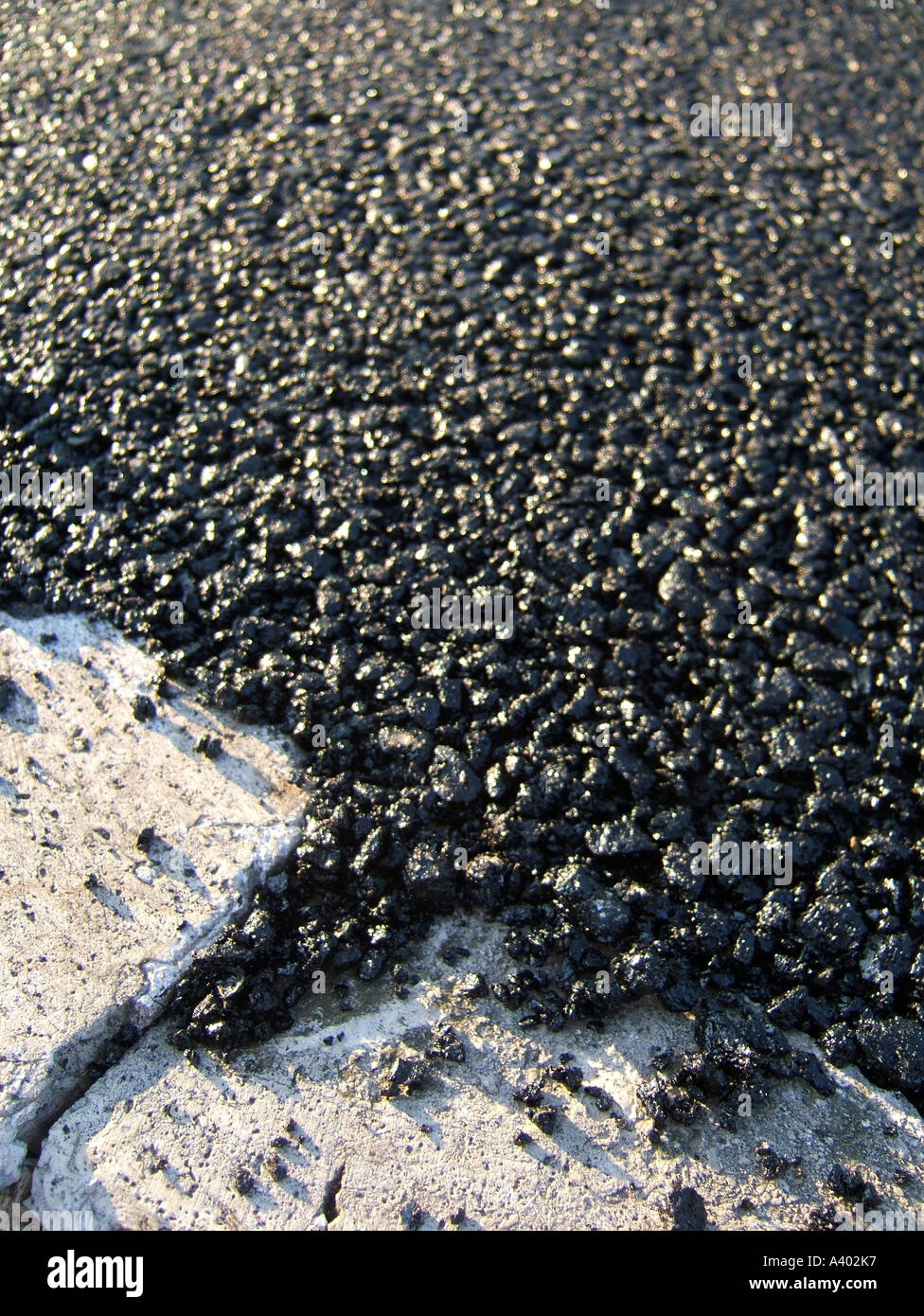 fresh tarmac on road surface Stock Photo - Alamy