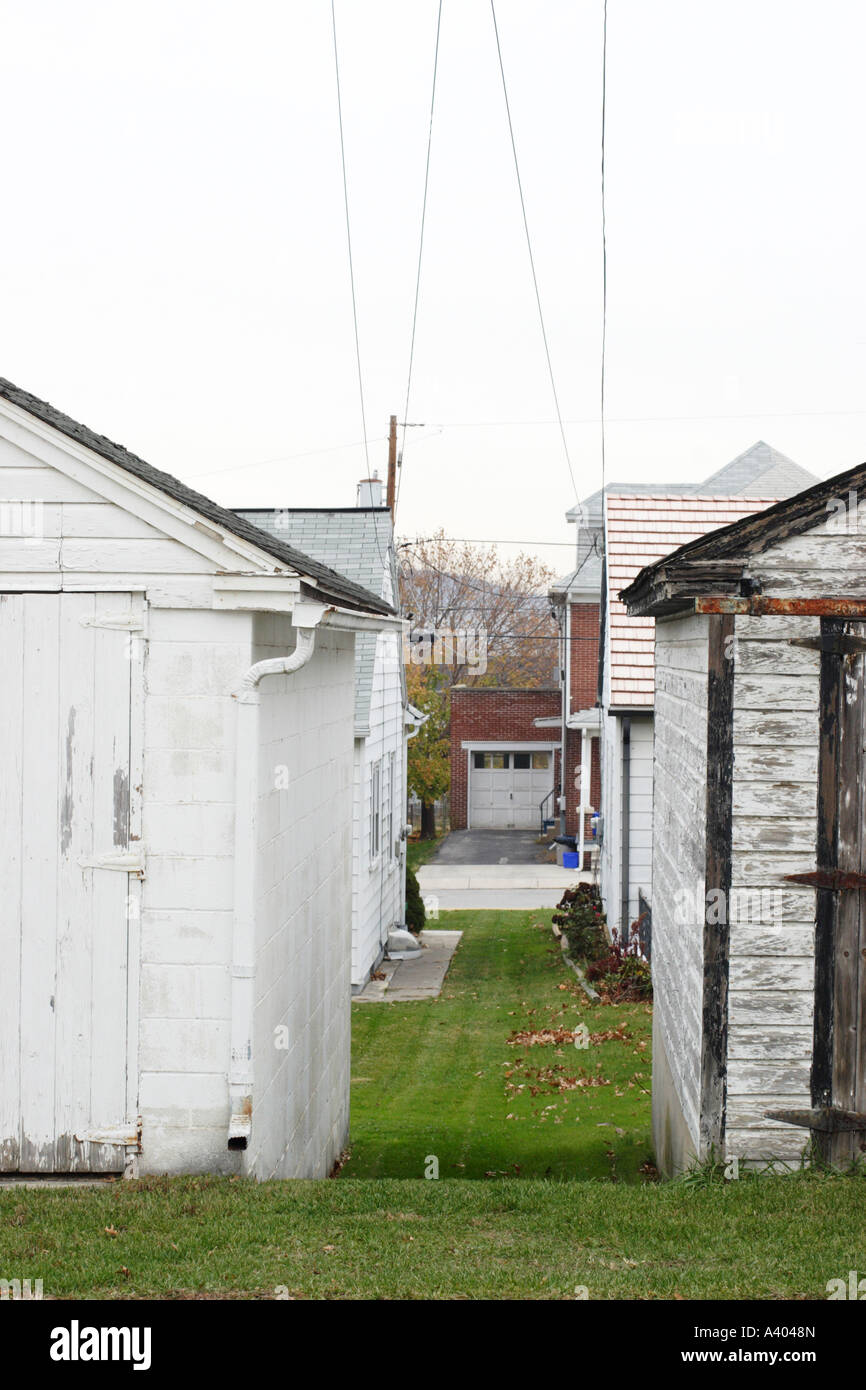Shacks off of an allyway Stock Photo - Alamy