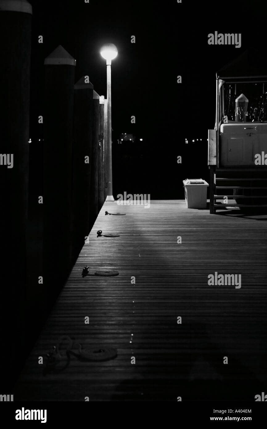 A boat dock at night Stock Photo - Alamy