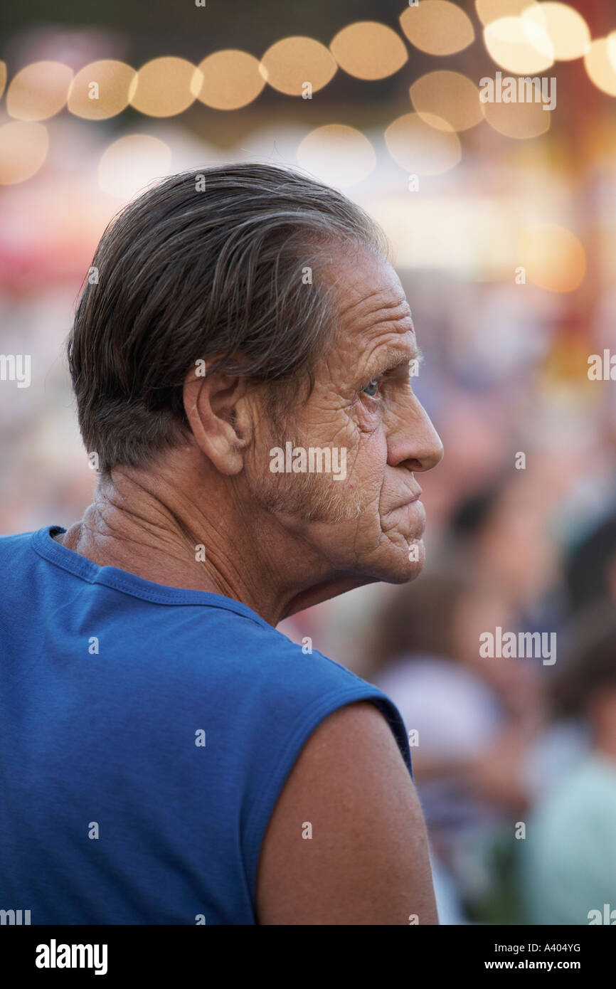 Profile of an old man at a small county fair Stock Photo - Alamy