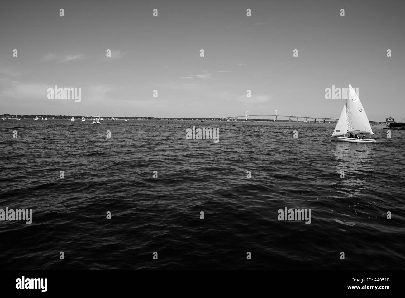 Sailboat sailing in the bay Stock Photo - Alamy