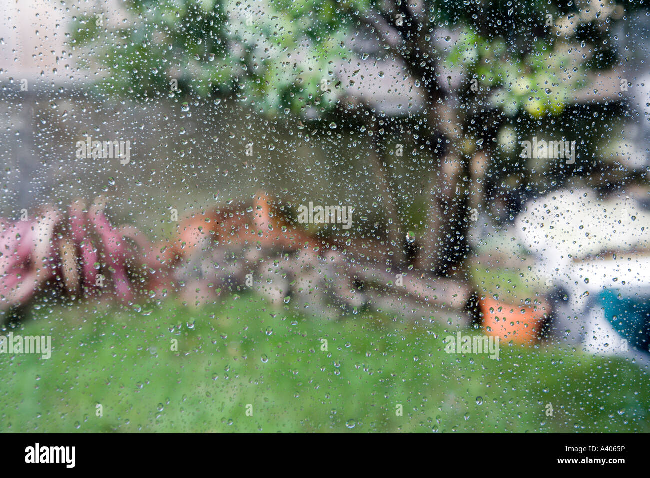 Rain on window pane Stock Photo - Alamy