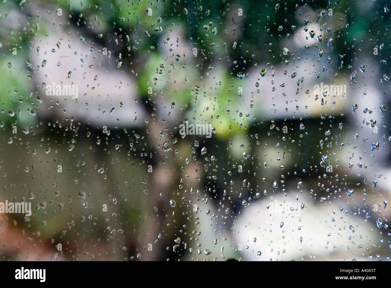 Rain on window pane Stock Photo - Alamy