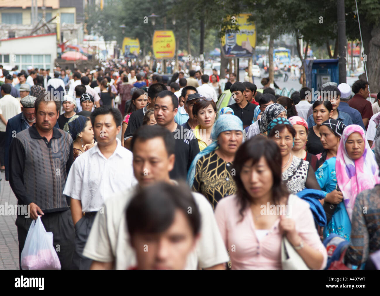 Crowds Of People Walking Along Pavement Stock Photo - Alamy