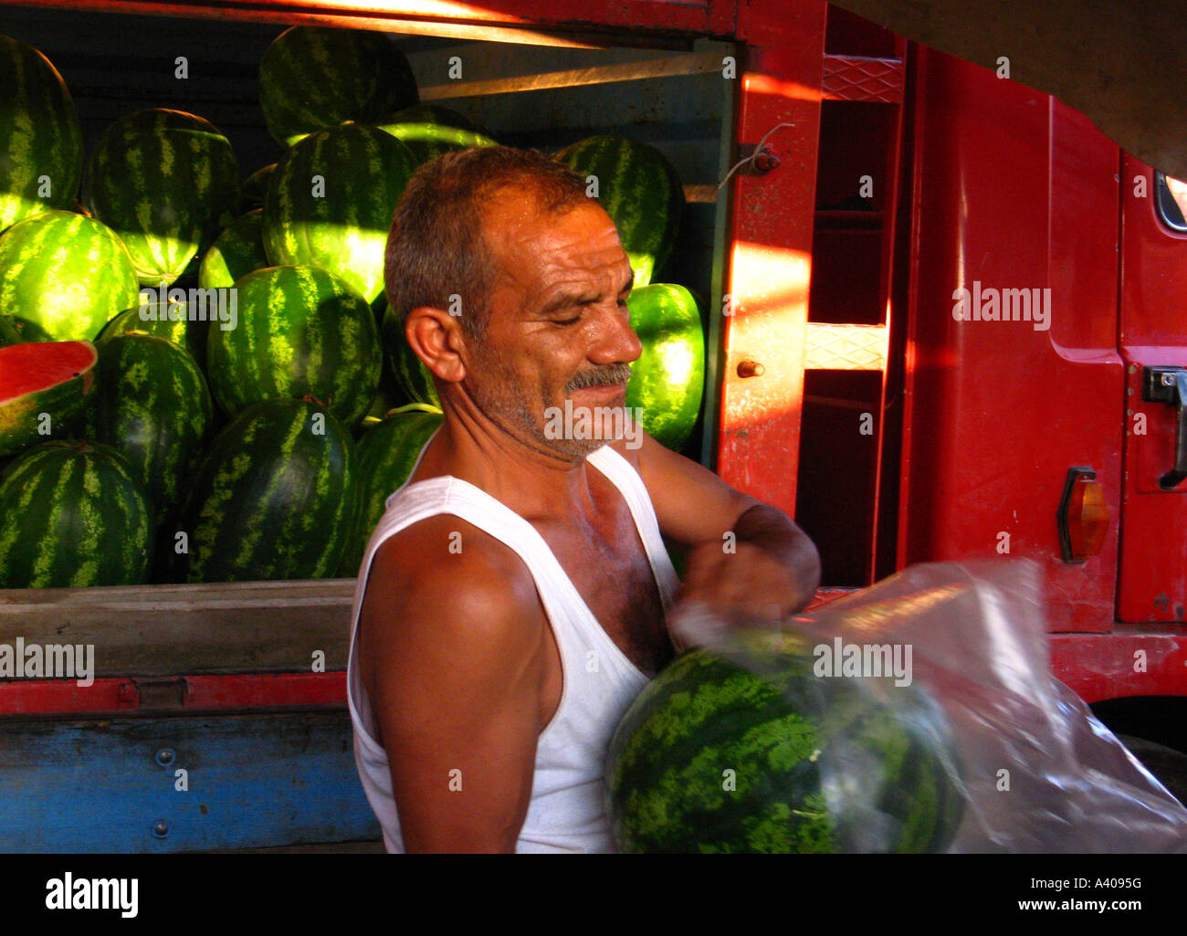 Turk sells watermelons at street bazaar Alanya Turkey Stock Photo - Alamy