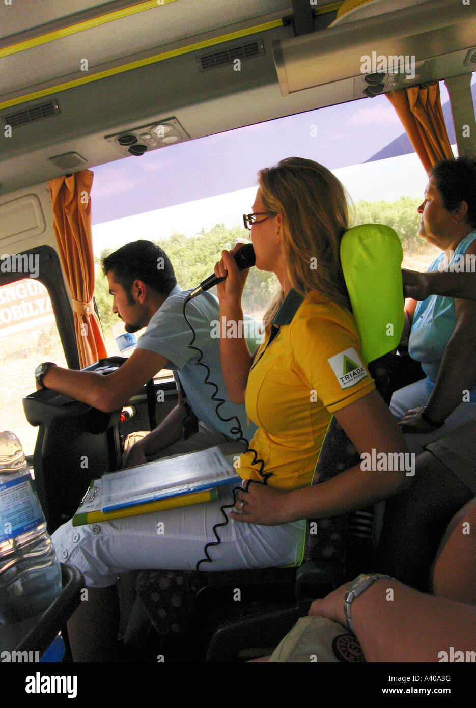 Tour guide speaking on microphone hi-res stock photography and images ...