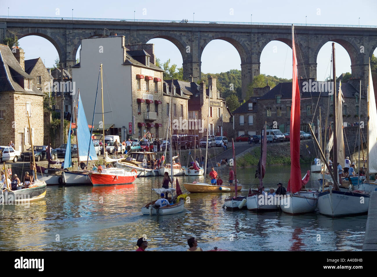 SAILBOATS AND HOUSES AND VIADUCT AT DINAN HARBOUR ON RANCE RIVER ...