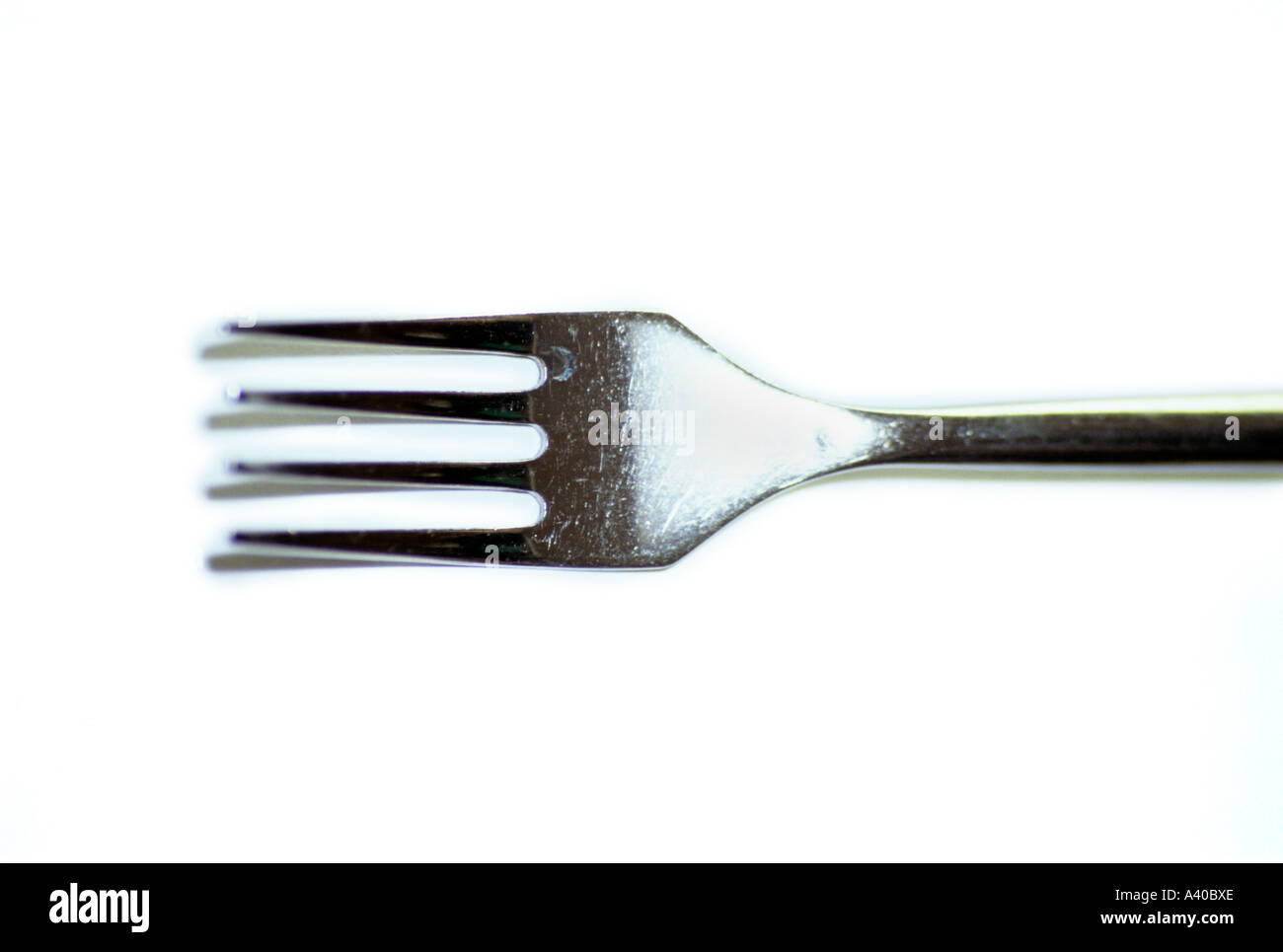 Fork on white background Stock Photo - Alamy
