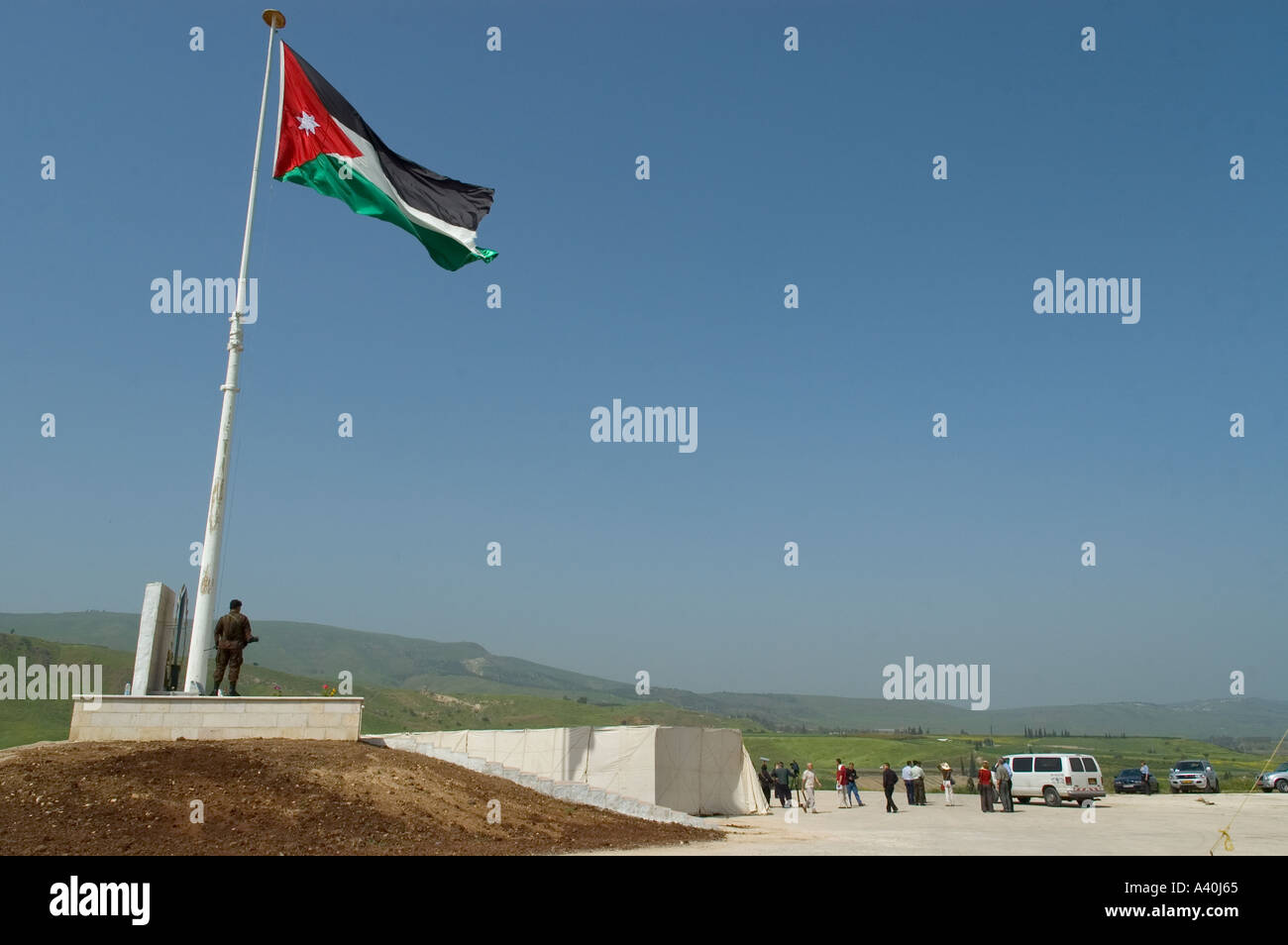 Jordan Bakoora Peace Island view with huge jordanian flag flapping in ...
