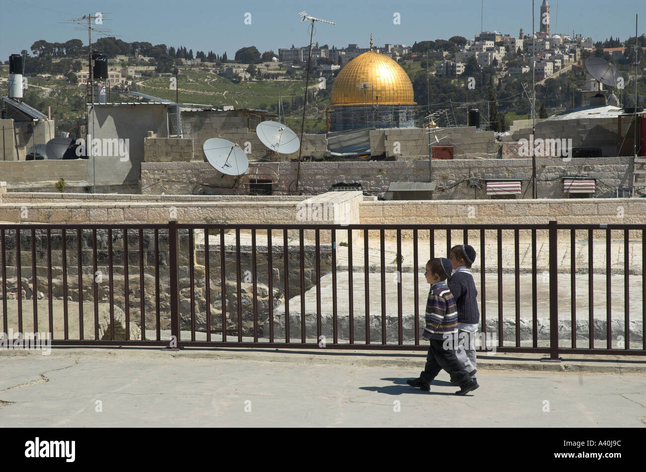 Israel Jerusalem Old City two young jewish boys walking with Dome of ...