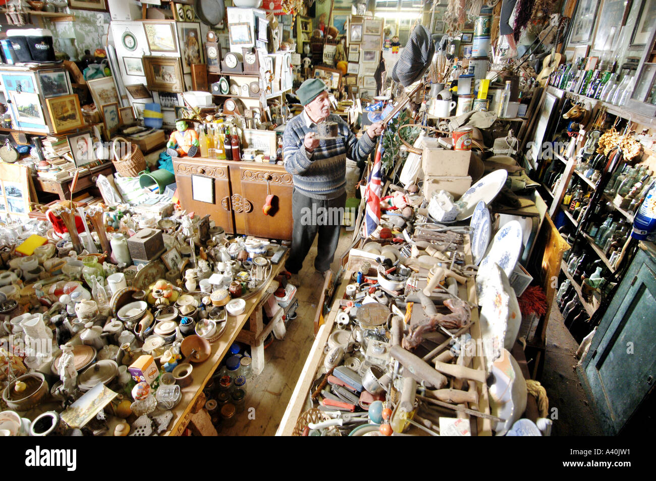 Old man with the thousands of possessions he has hoarded over many ...