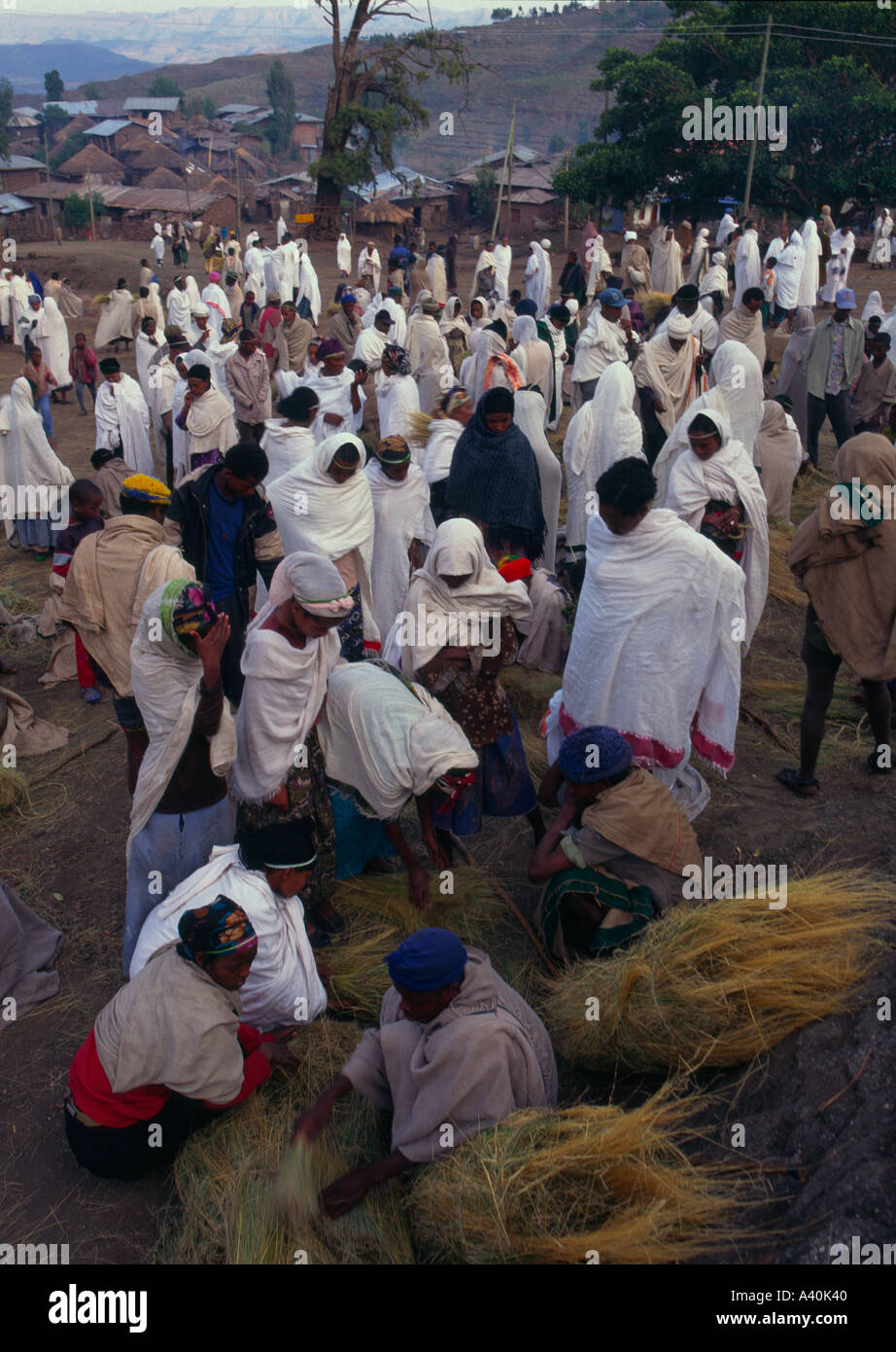 Ethiopia Lalibela morning herbs market crowd of people wearing white ...