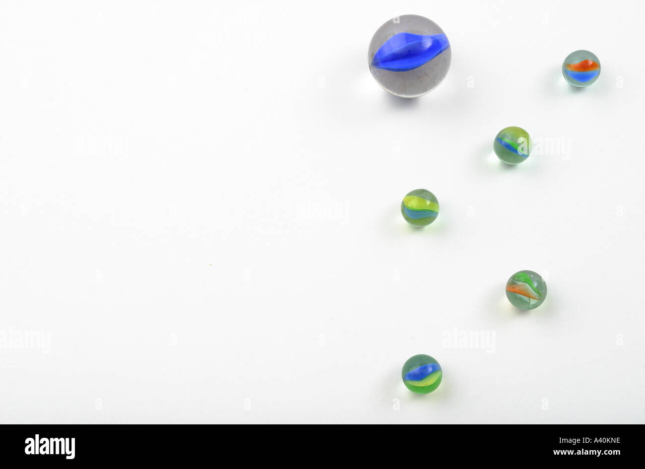 Six marbles on a white background Stock Photo - Alamy