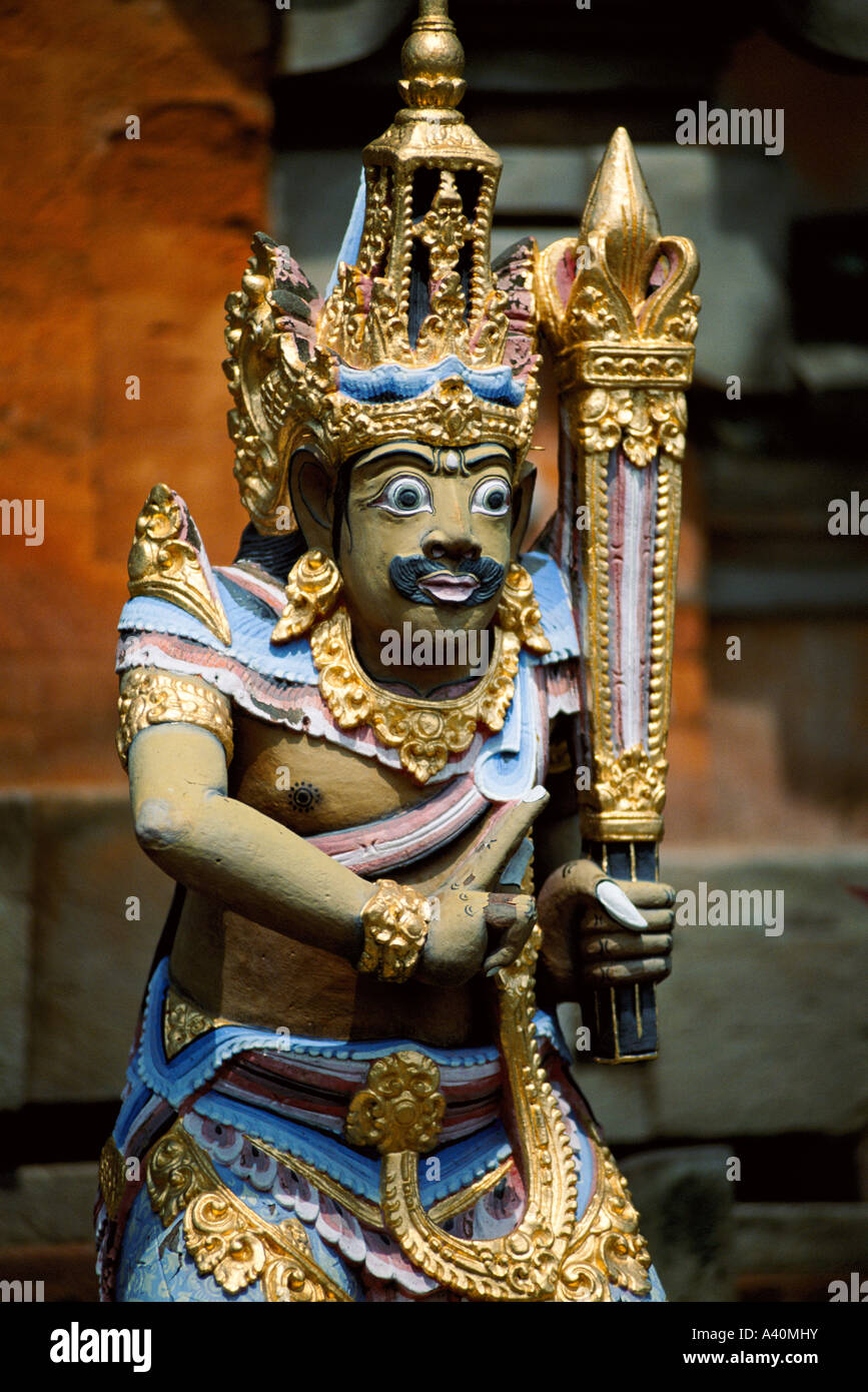 Symbolic wood carving statue Bali Indonesia Stock Photo - Alamy