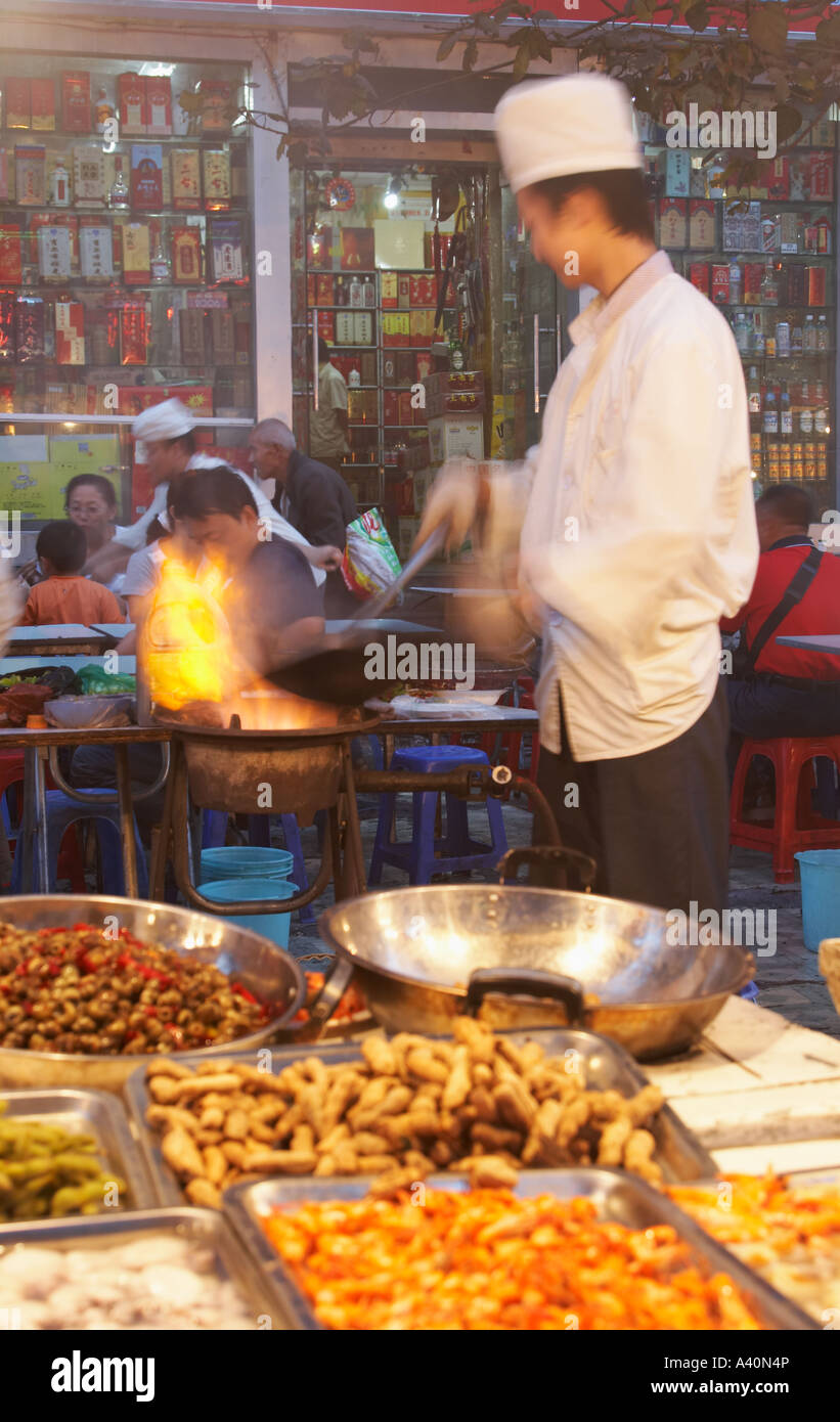 Chinese Chef Cooking Food At Night Market Stock Photo - Alamy