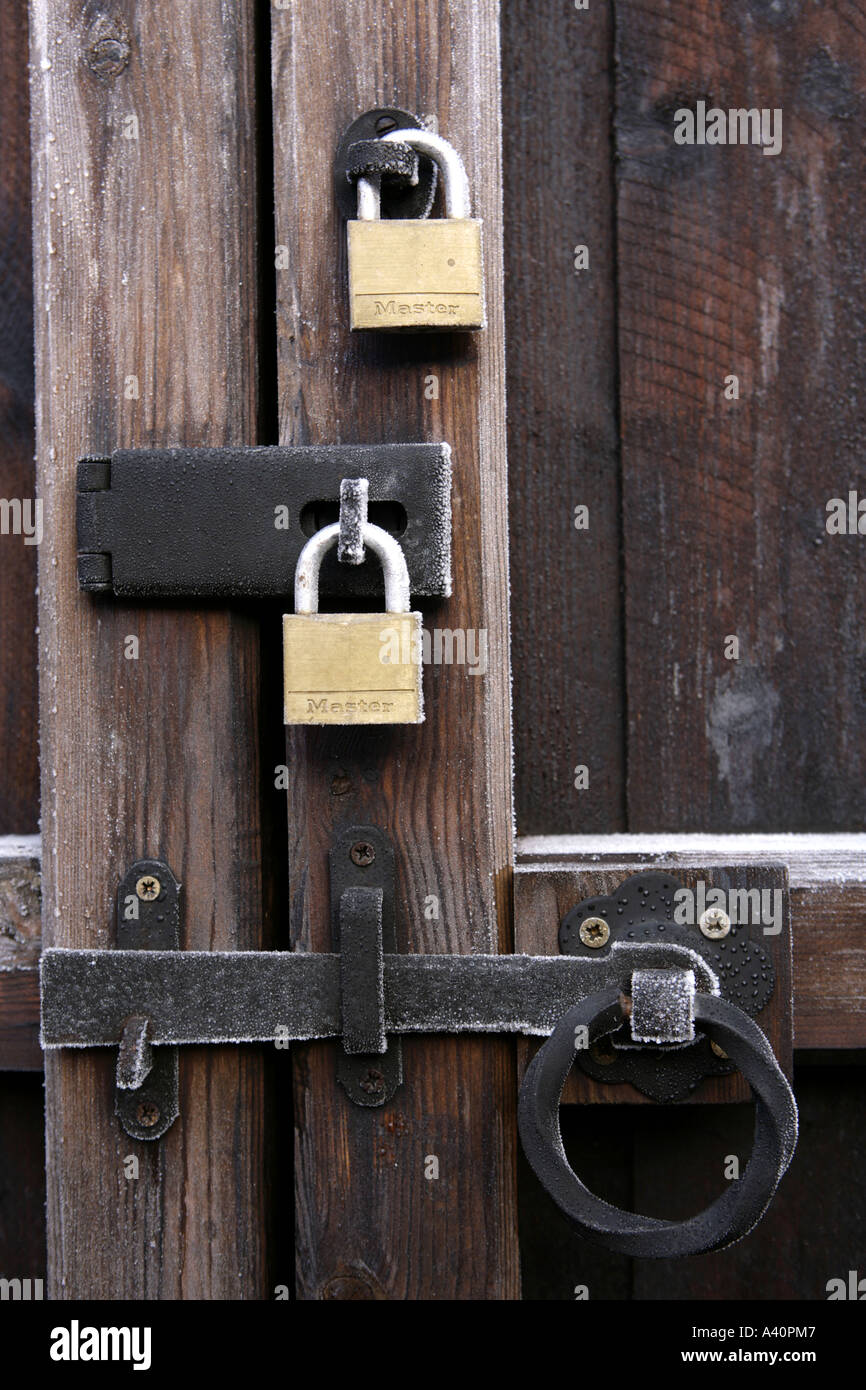 FROST COVERED PADLOCKS ON A GATE Stock Photo - Alamy