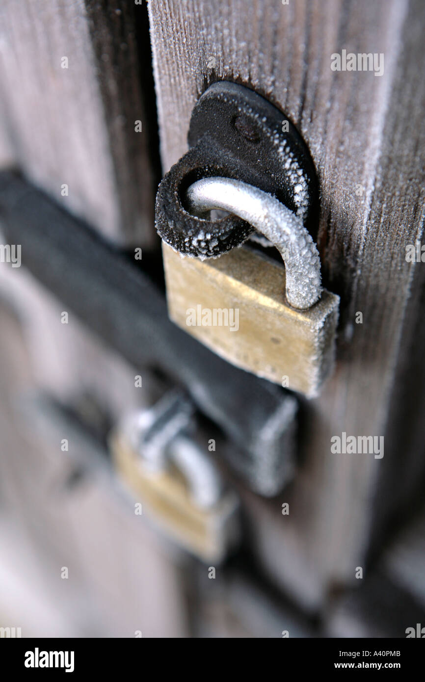 FROST COVERED PADLOCKS ON A GATE Stock Photo - Alamy