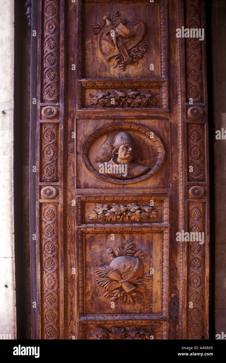 Panels in one of the wooden doors of the Cathedral, Florence Stock ...
