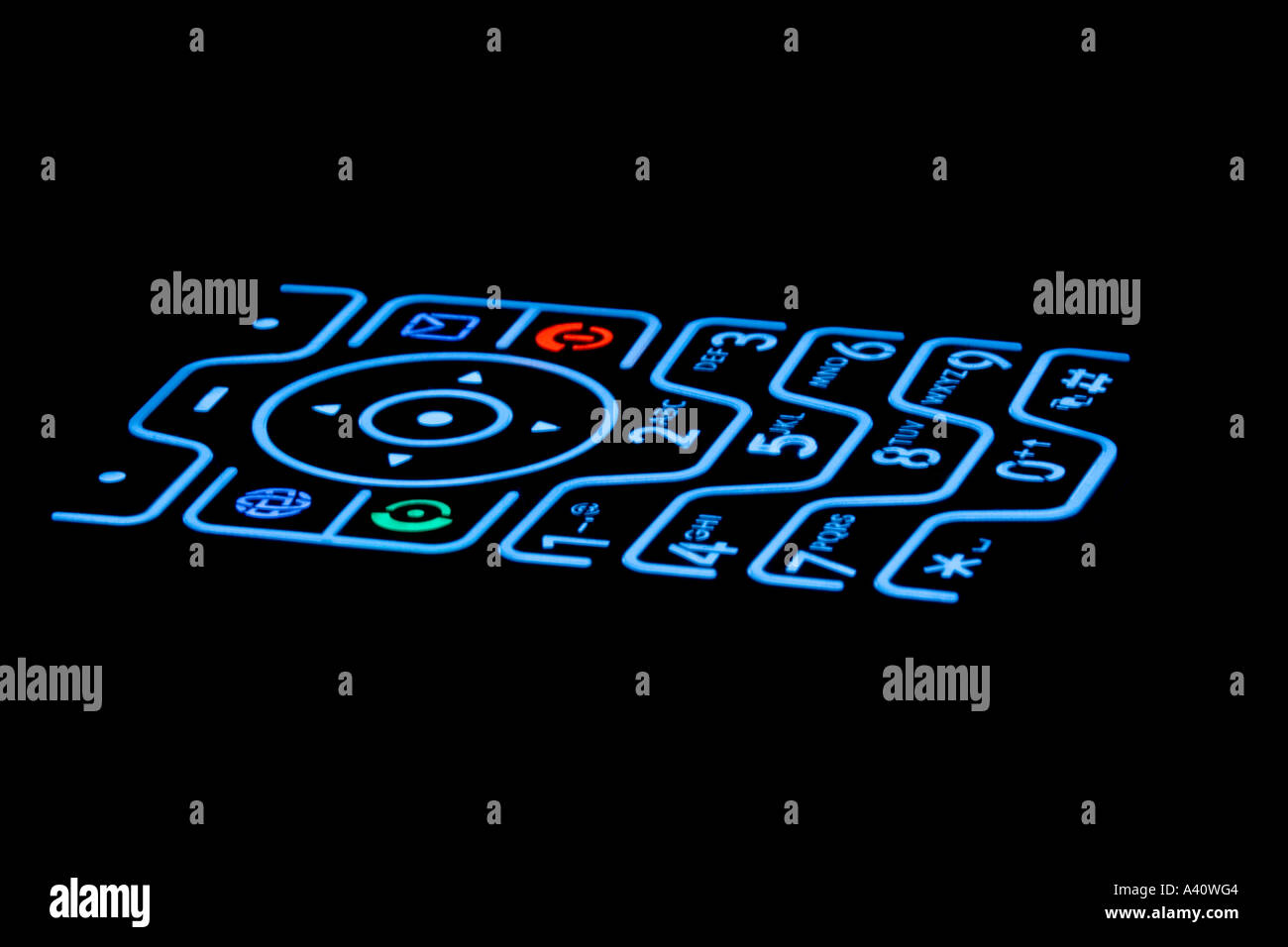 Illuminated modern mobile phone keypad against black background side on ...